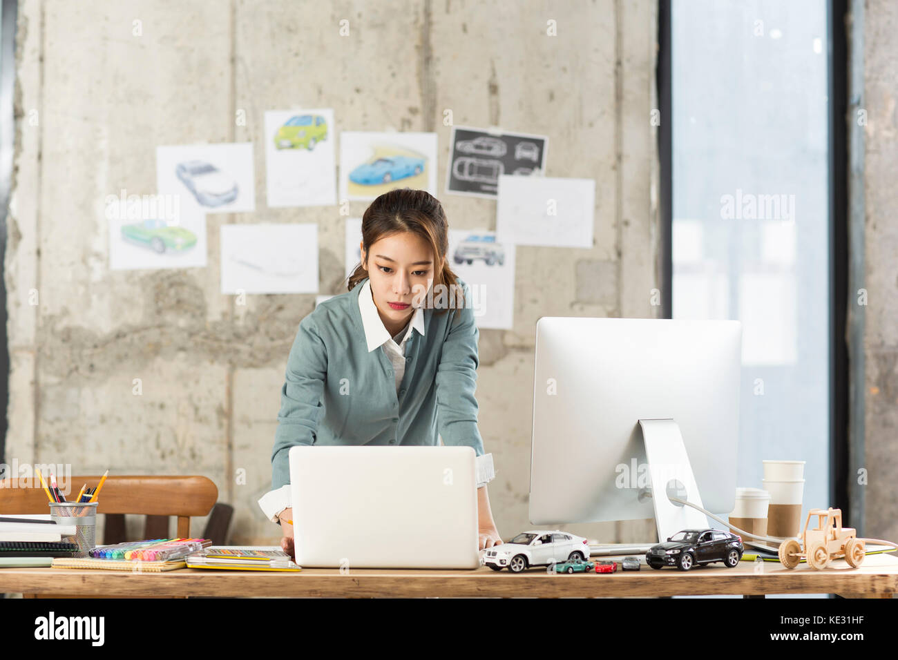Young female car designer at work Stock Photo - Alamy
