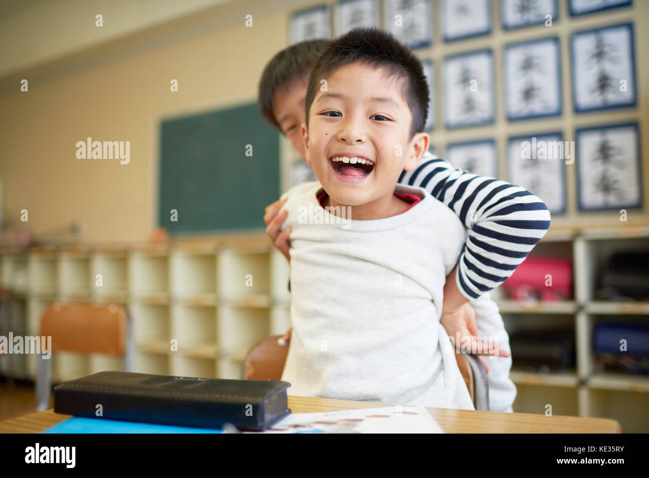 Children relaxing classroom hi-res stock photography and images - Alamy