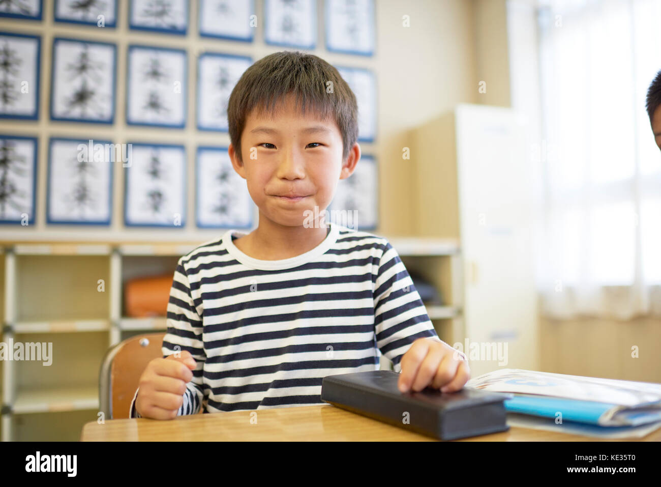 Japanese elementary school kid in the classroom Stock Photo - Alamy
