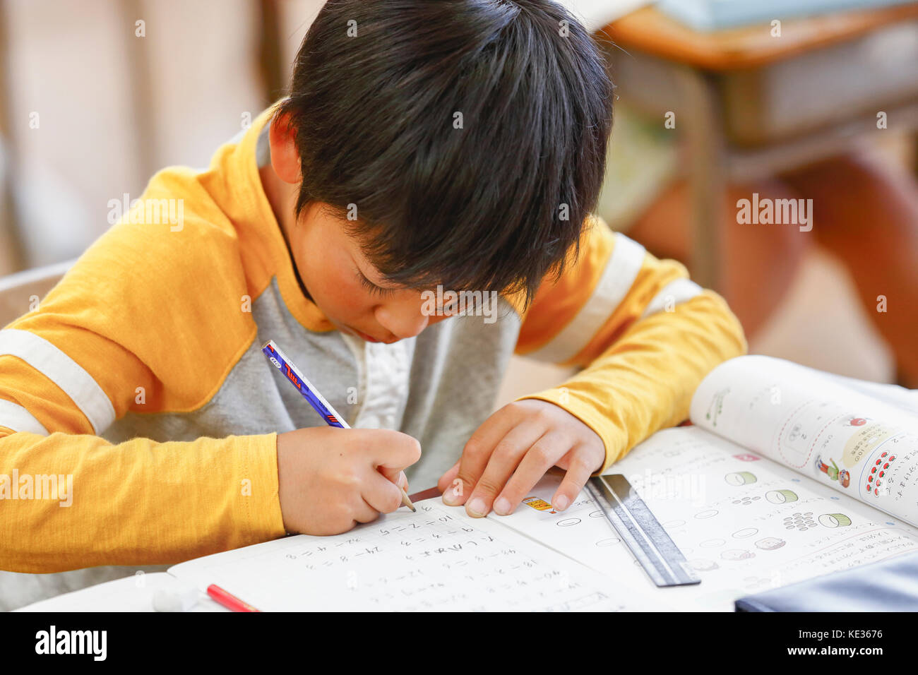 Japanese elementary school kid in the classroom Stock Photo - Alamy