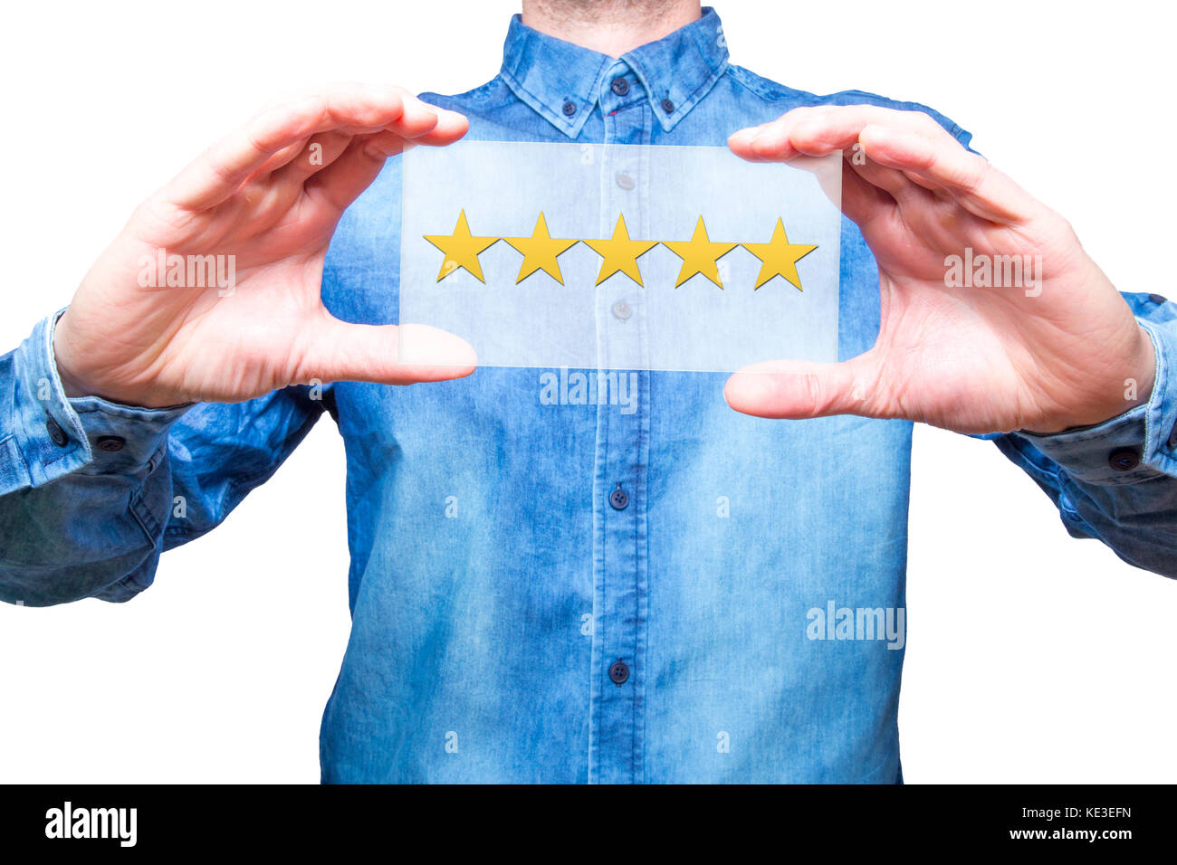 Hand holding five stars rating in his hands, representing business ...