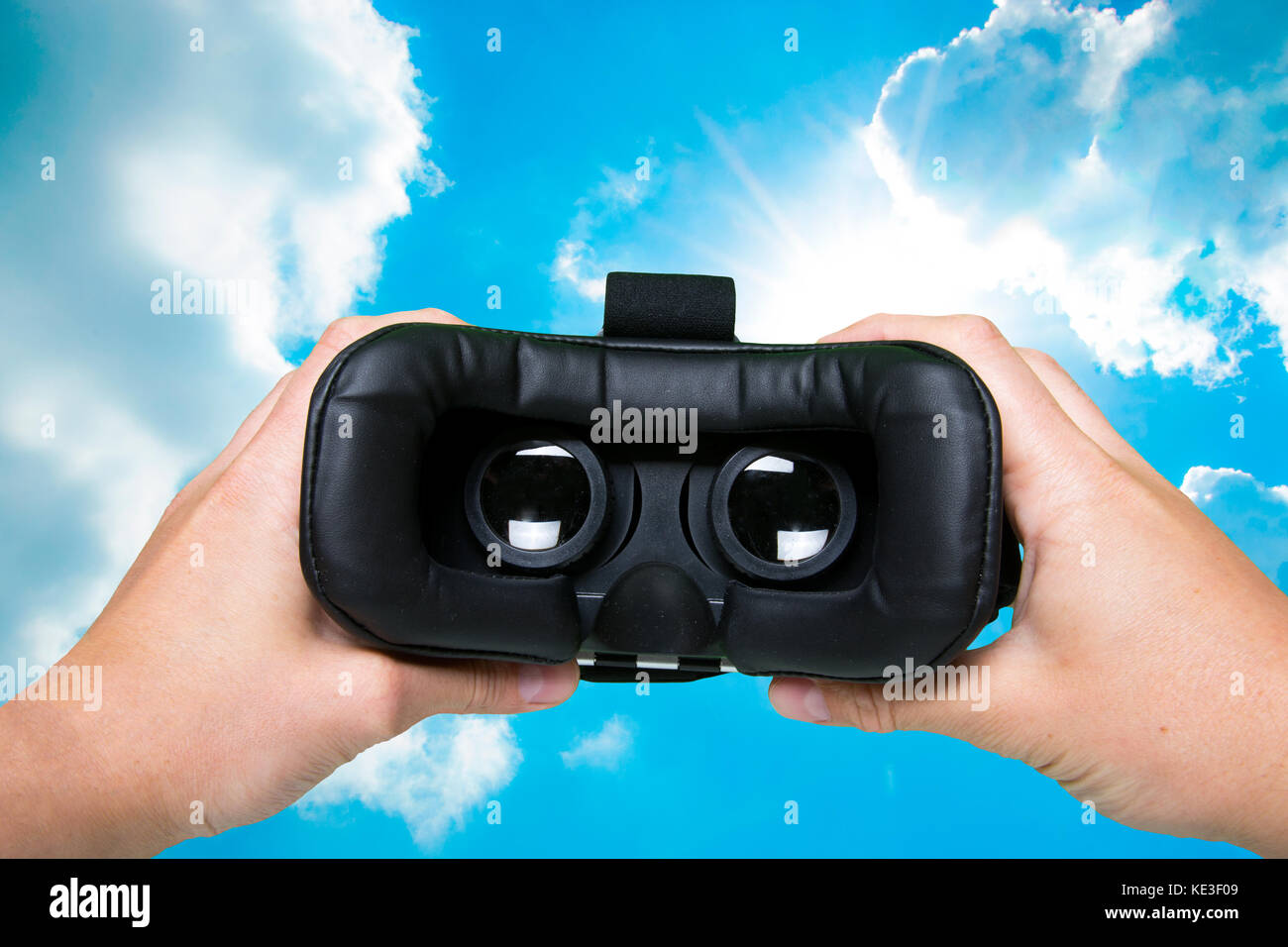Hands of man holding virtual reality goggles. Flat lay . Stock Image ...