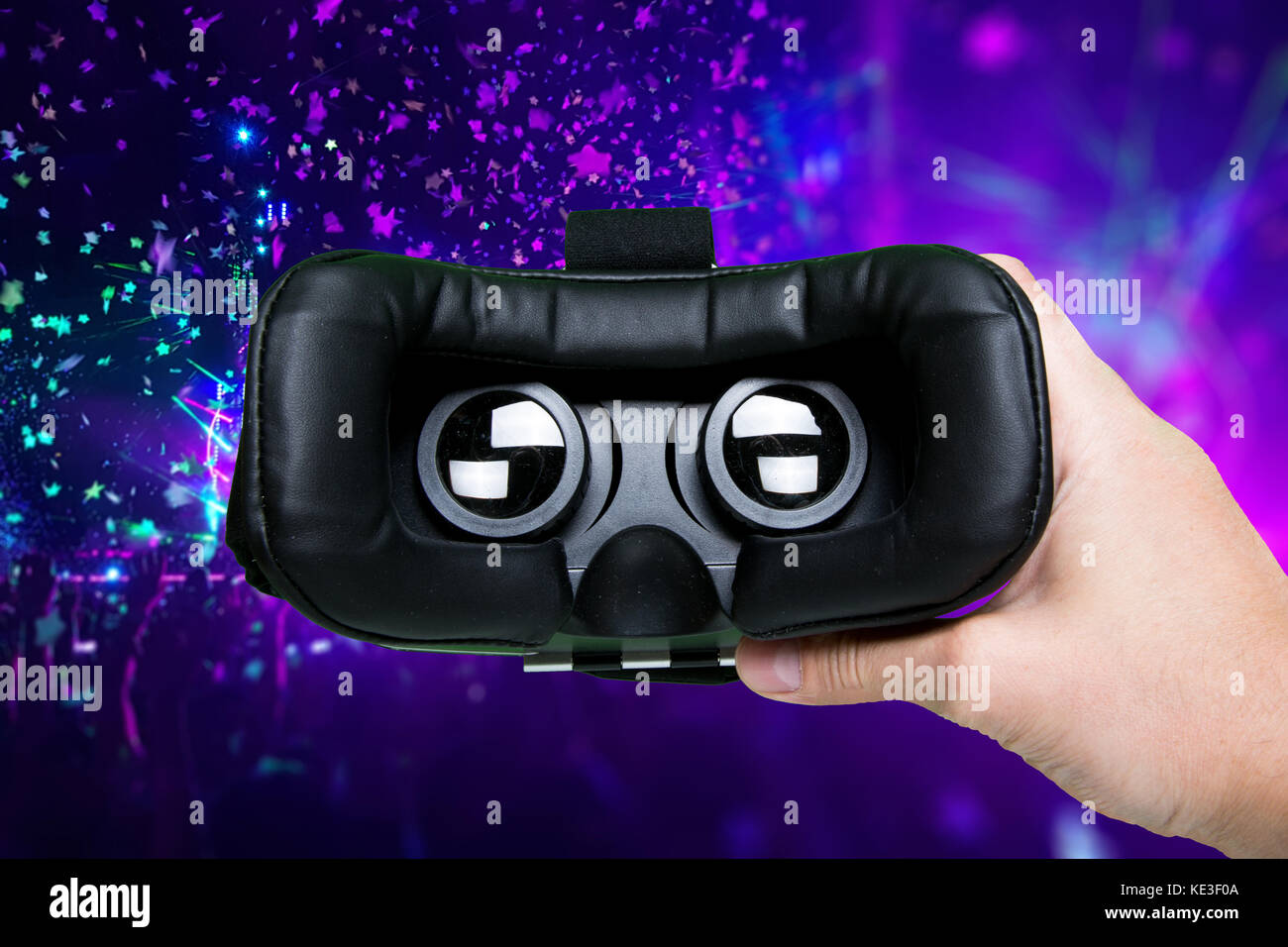Man hand holding VR glasses on colorful background.Top view/Hands of ...