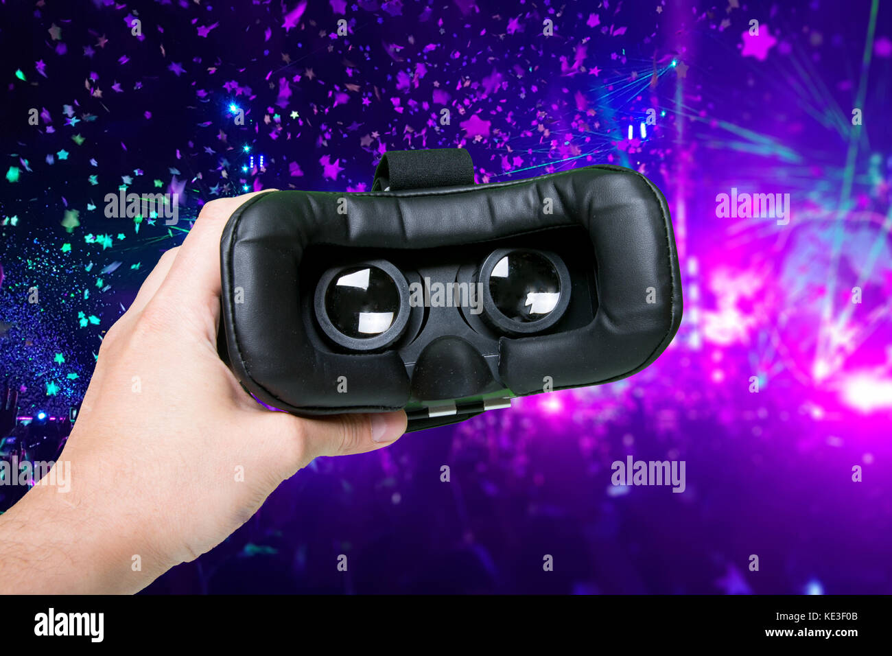 Space image in virtual reality glasses. Hands holding switched-on vr ...