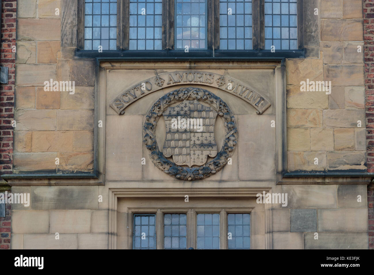 Coat of arms and motto in stone on the side of Temple Newsam House ...