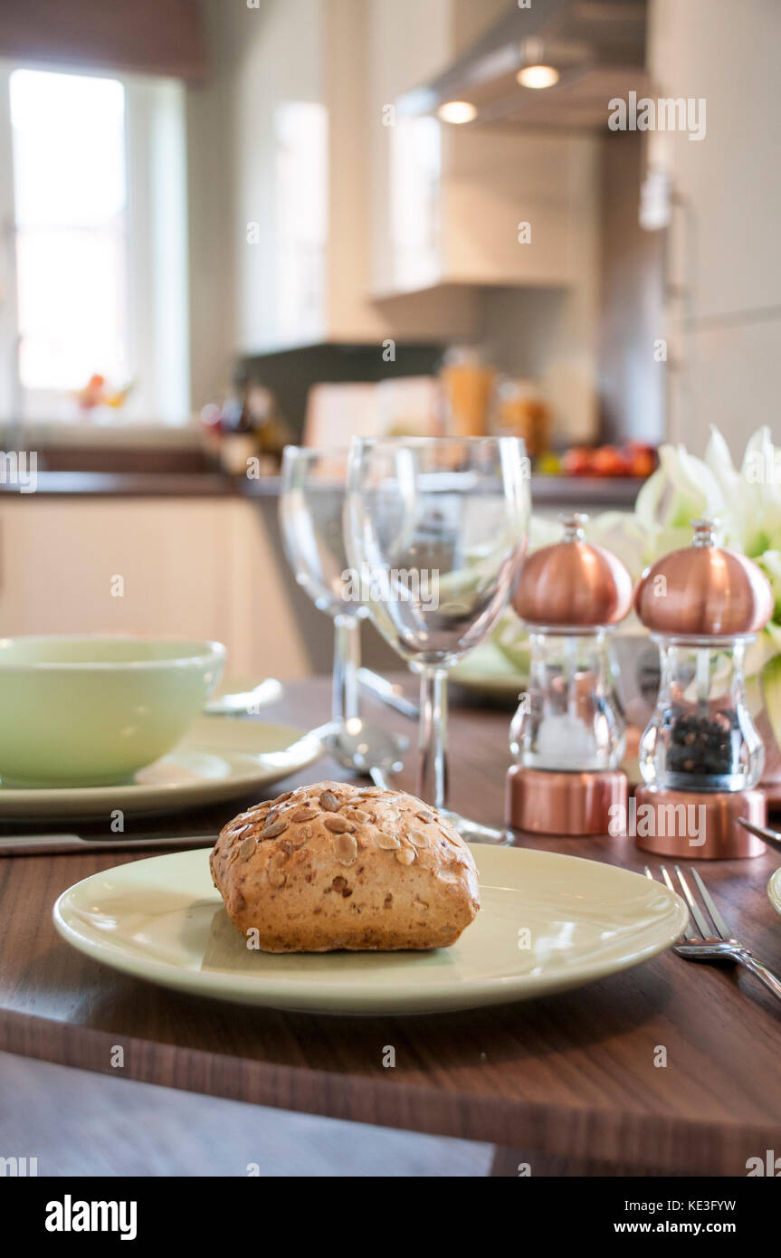 Family dining kitchen set for lunch Stock Photo - Alamy