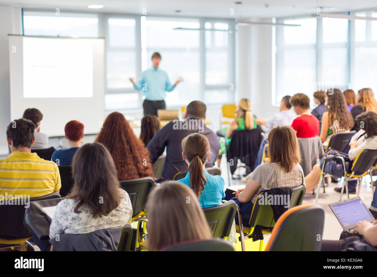 Speaker giving presentation on business conference Stock Photo - Alamy