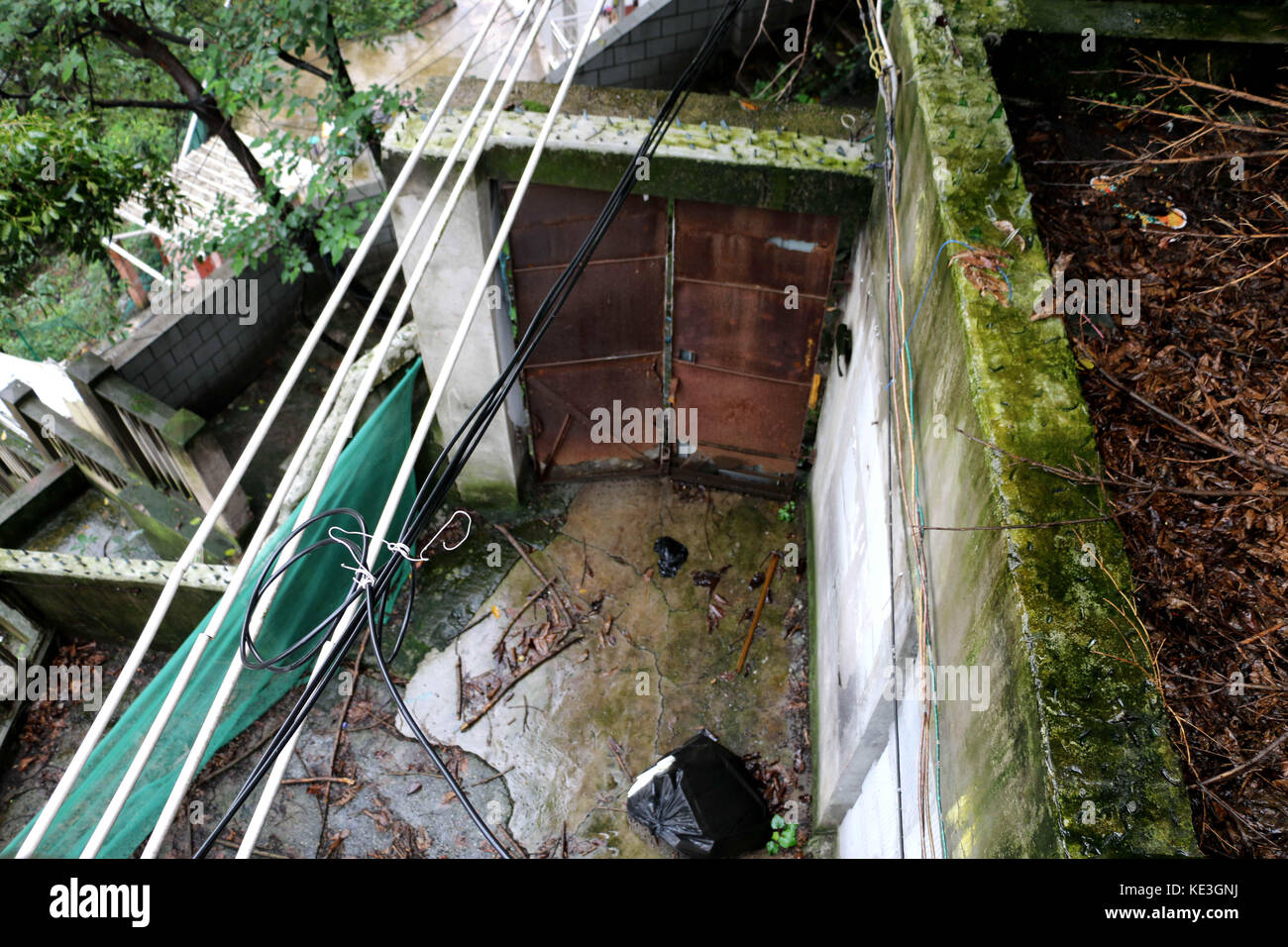 The houses built under the road are closed by local government in ...