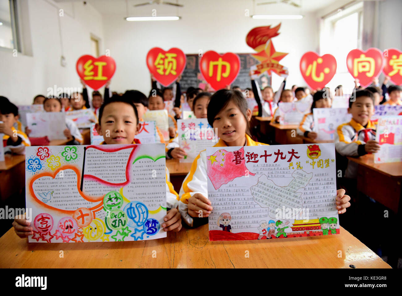 Pupils attend various activities to mark the 19th CPC National Congress ...