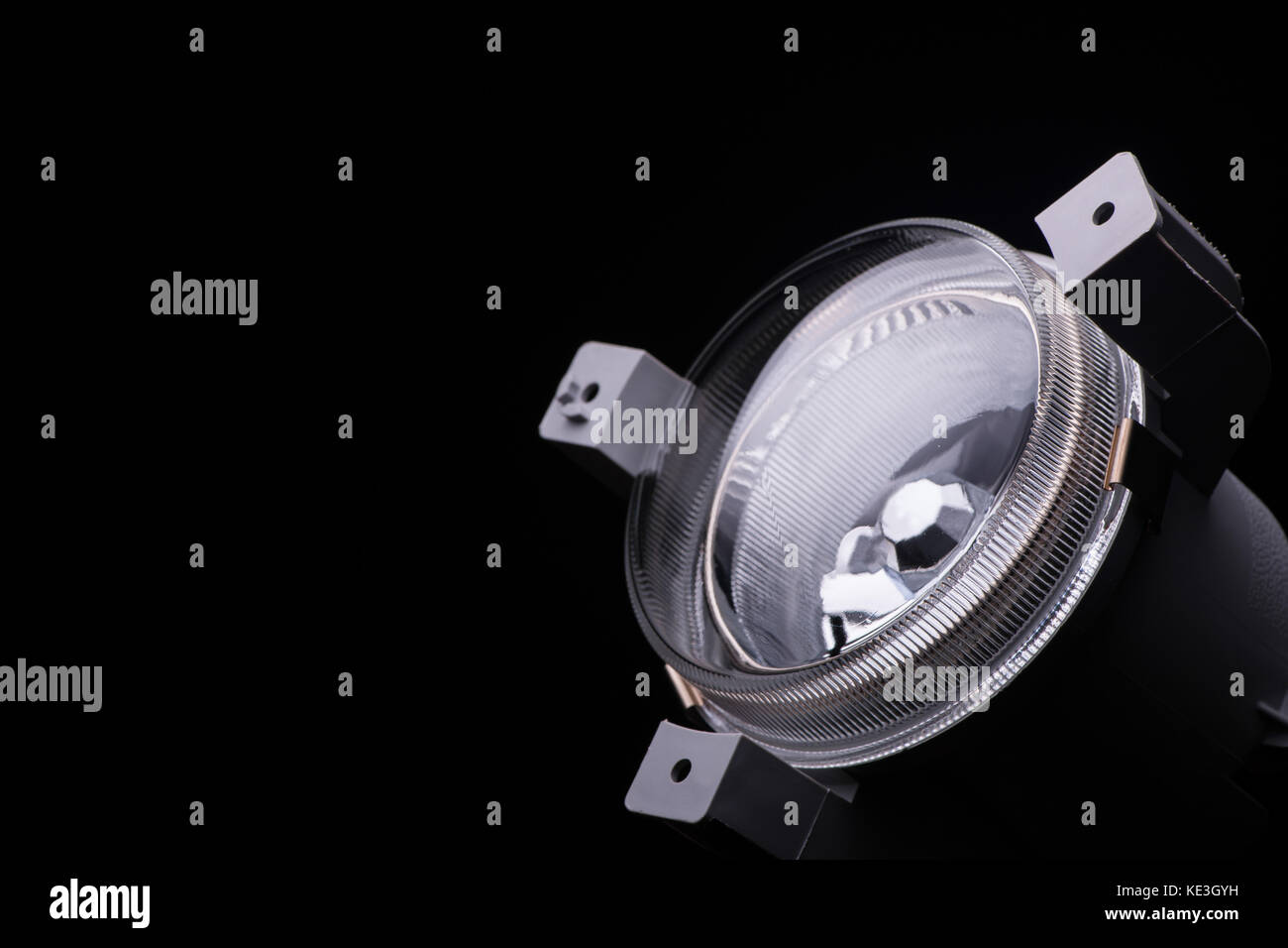 close-up round car headlights on a black background isolated Stock ...
