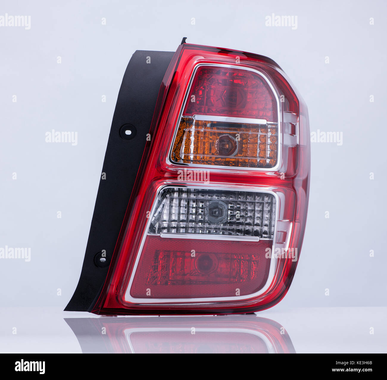 red car headlight isolated on light background Stock Photo - Alamy
