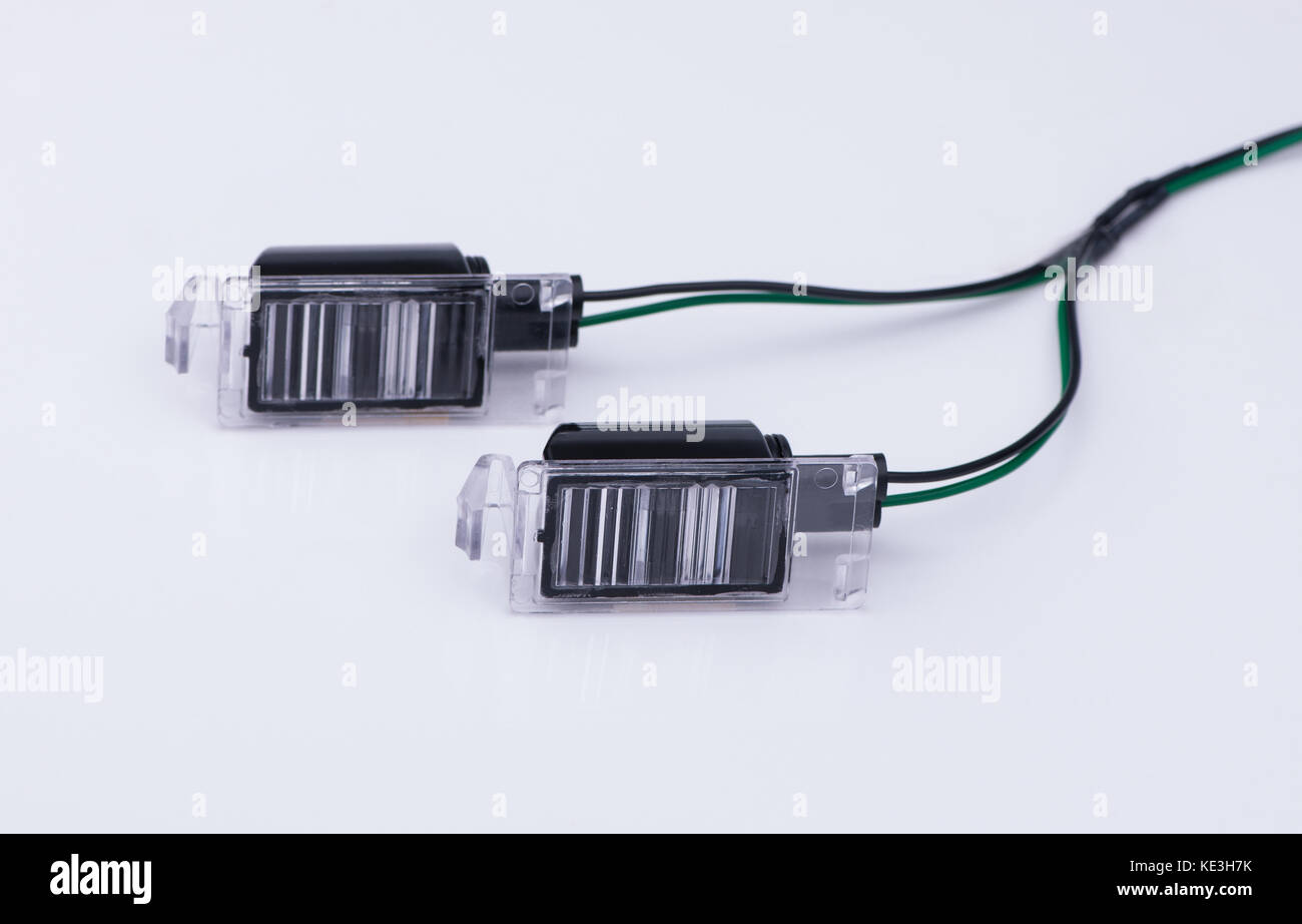 a small rectangular automotive headlight turn signals isolated on light ...