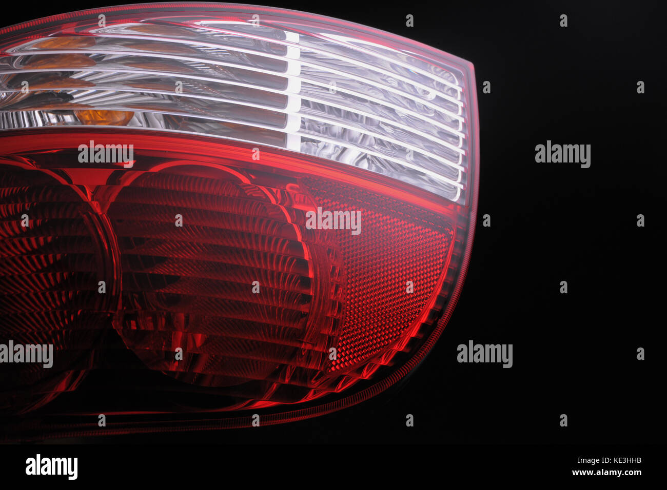 red car light on a black background isolated. cropped photo Stock Photo ...