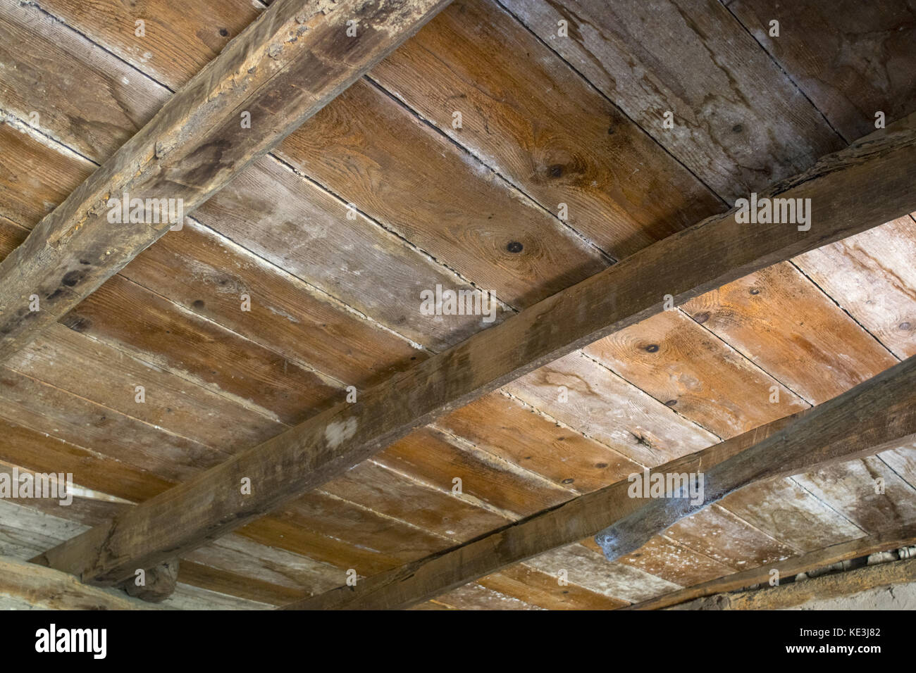old wooden ceiling composed from wooden boards and timbers Stock Photo ...