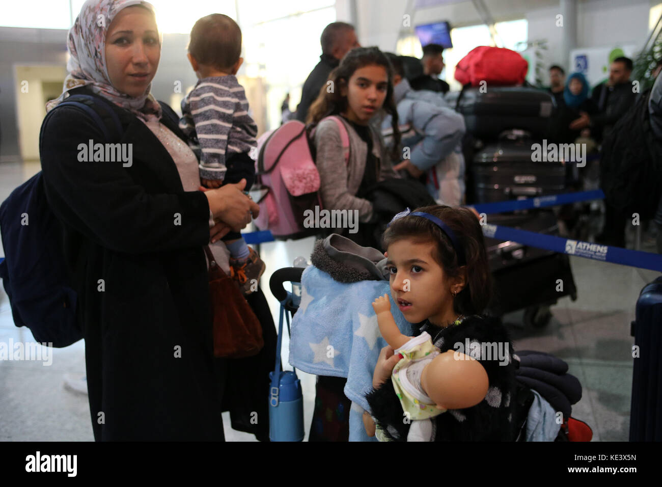 Iom refugee airport hi-res stock photography and images - Alamy