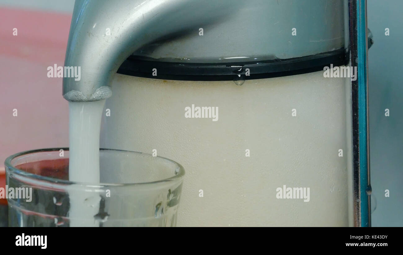 Woman make oxygen cocktail with device for oxygen scum. Oxygen cocktail ...