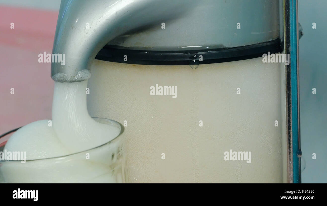 Woman make oxygen cocktail with device for oxygen scum. Oxygen cocktail ...