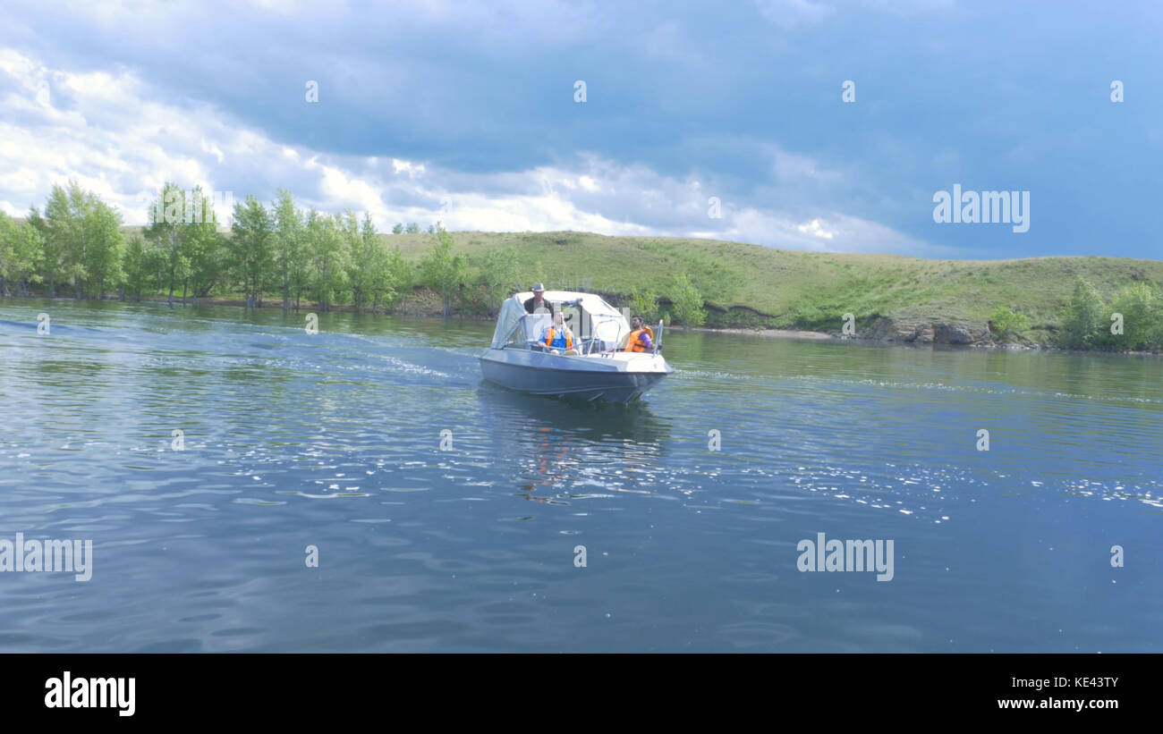 Two people in a dinghy hi-res stock photography and images - Alamy