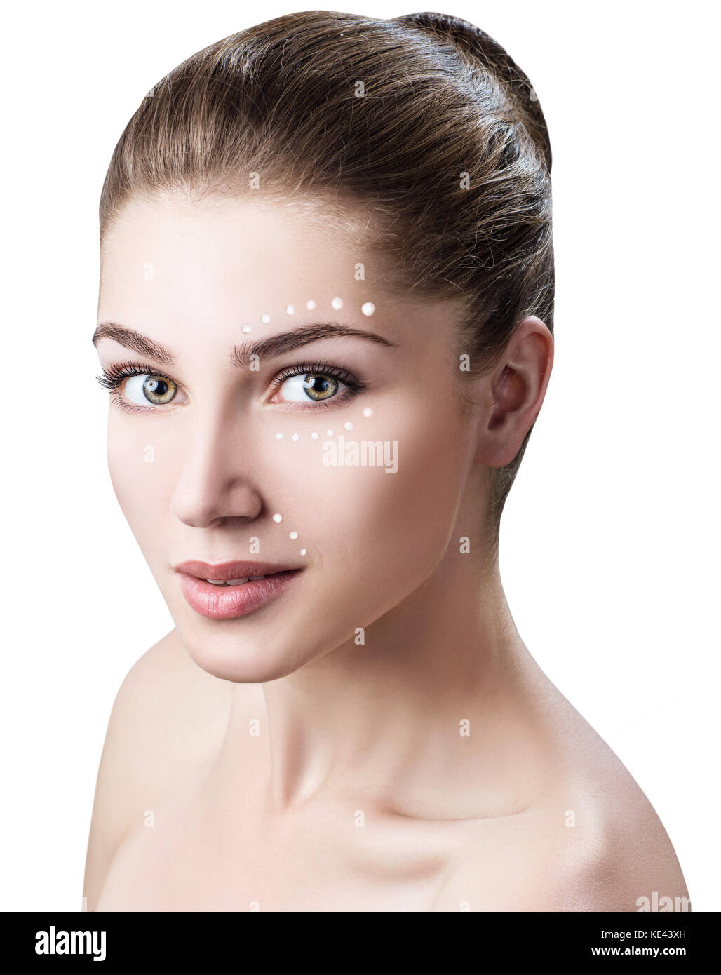 Young sensual woman with cream dots on face Stock Photo - Alamy