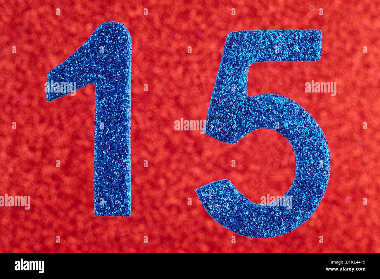Number fifteen blue color over a red background. Anniversary ...
