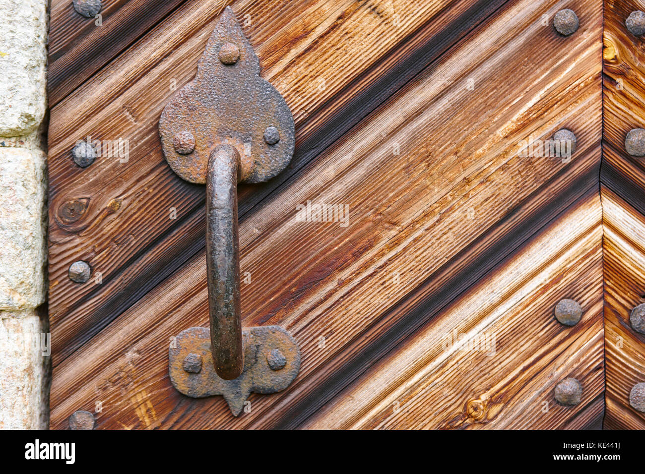 Antique door knob over a rusty wooden door. Horizontal Stock Photo - Alamy