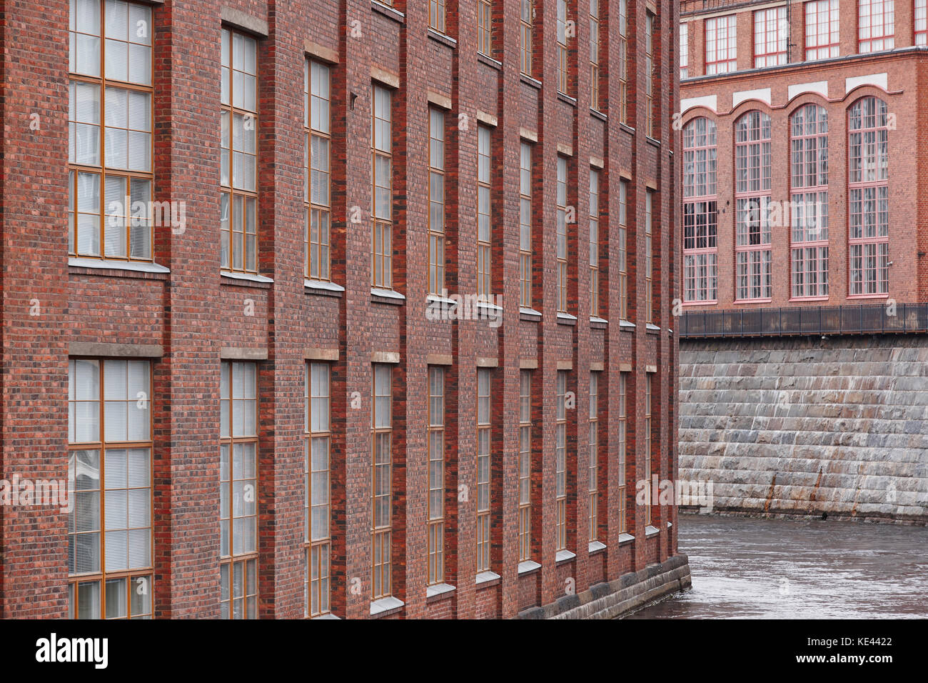 Old red brick facade factory buildings in Tampere, Finland. Suomi Stock ...
