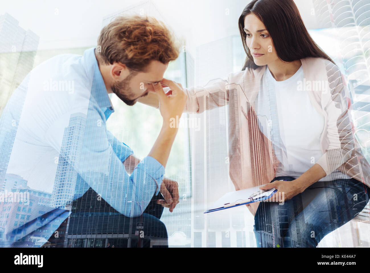 Depressed man visiting professional psychologist Stock Photo - Alamy