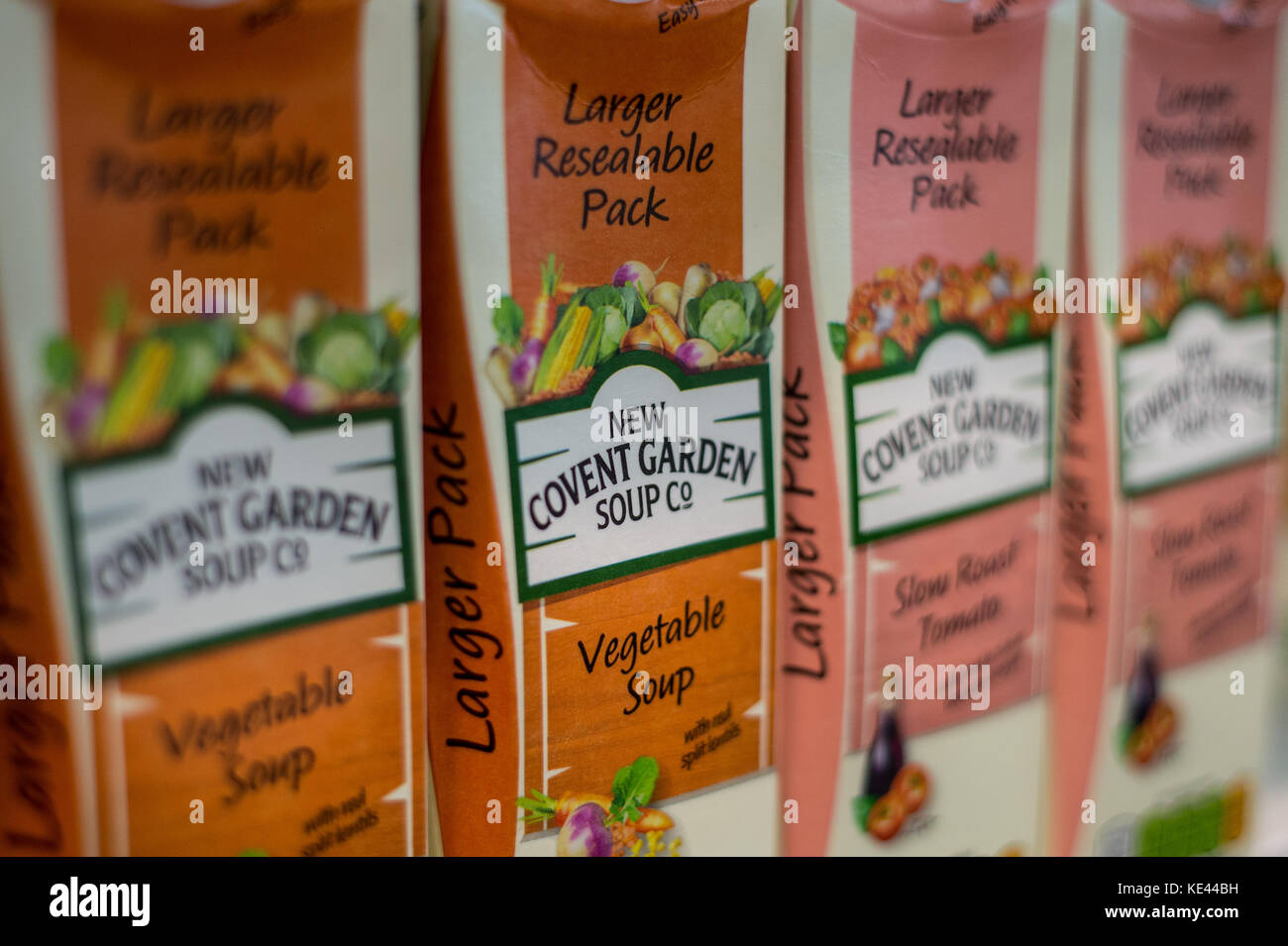 Cartons of covent garden soup stacked own the shelf in a UK Supermarket ...