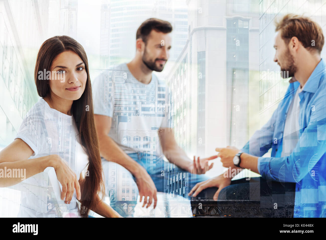 Positive woman sitting on the chair Stock Photo - Alamy