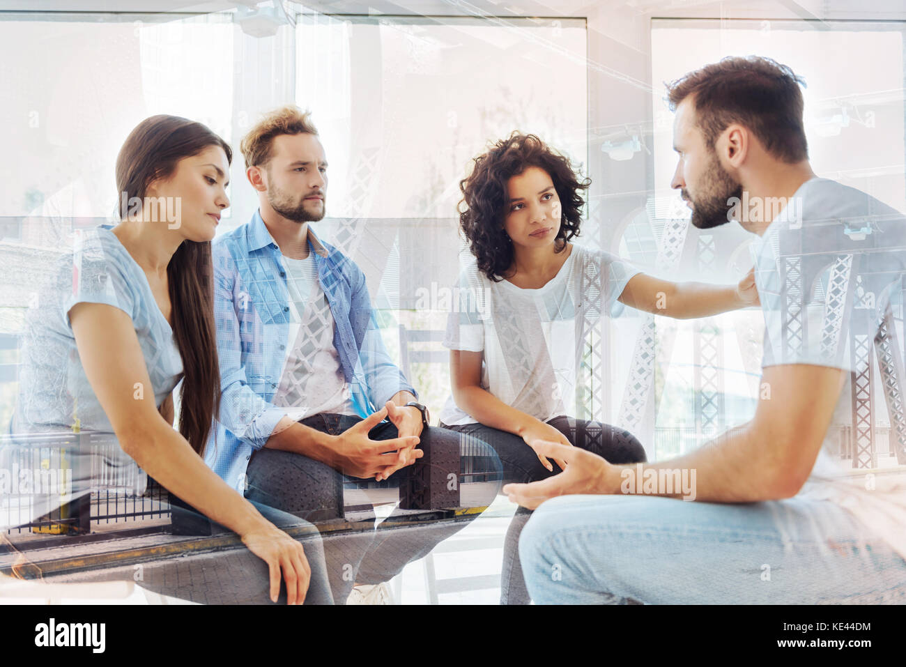 Group of friends expressing sympathy Stock Photo - Alamy