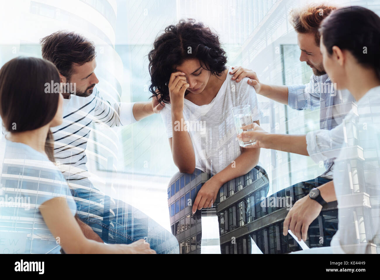 Stressed woman being supported by friends Stock Photo - Alamy