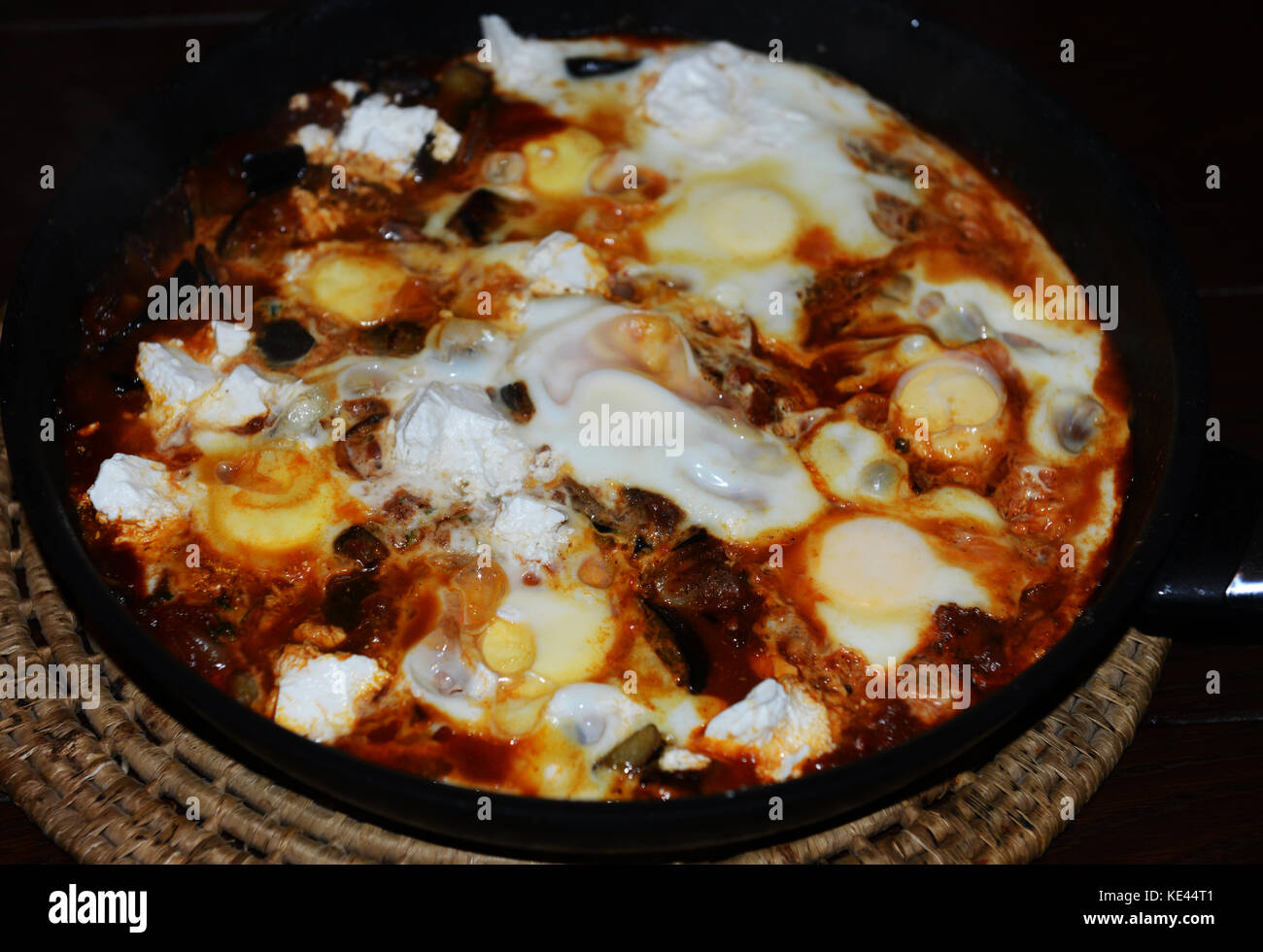 shakshuka served with fresh bread. Shakshuka is a popular breakfast ...