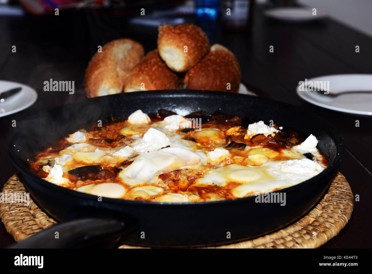 shakshuka served with fresh bread. Shakshuka is a popular breakfast ...