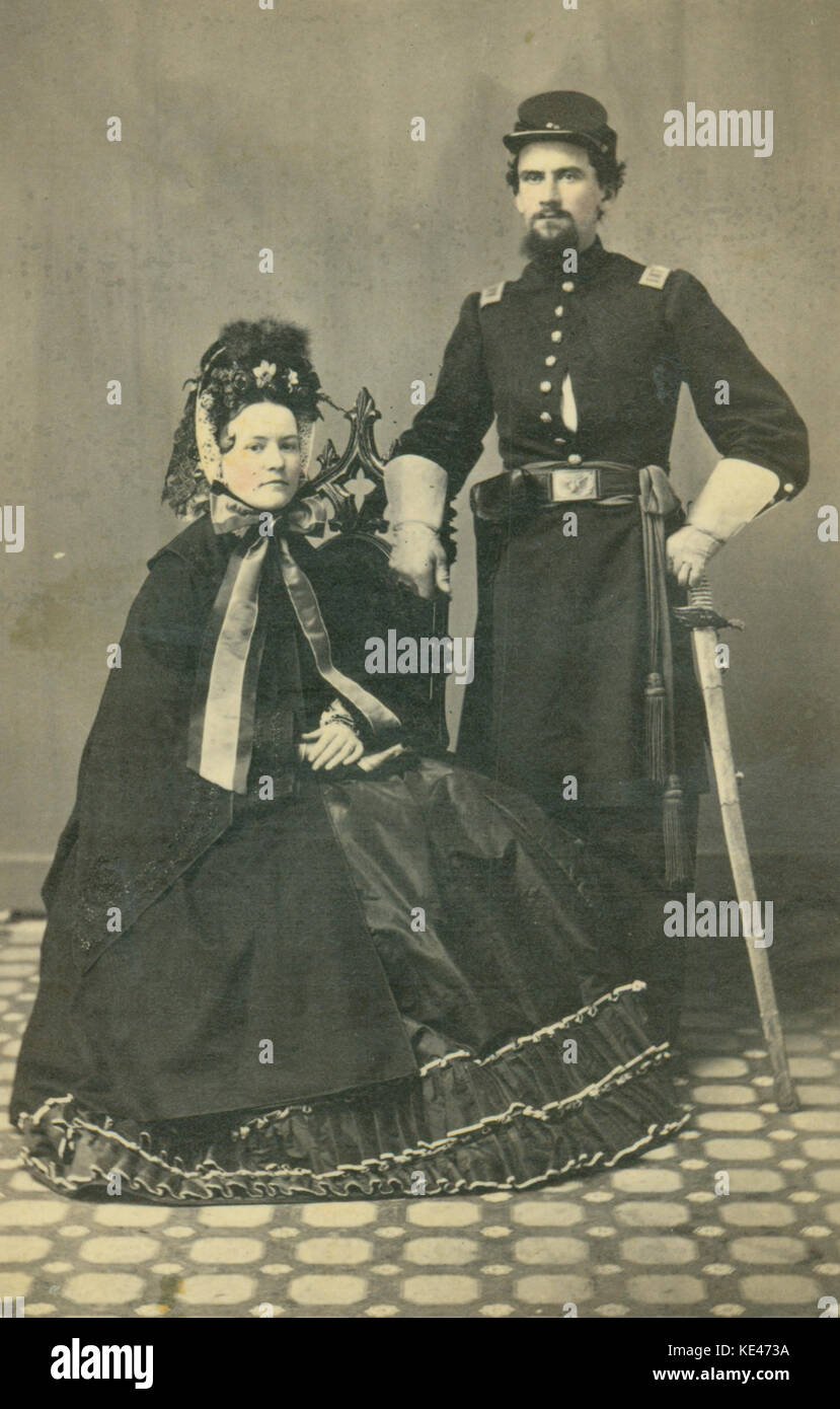 A photograph of an unidentified Union Army captain alongside a woman ...