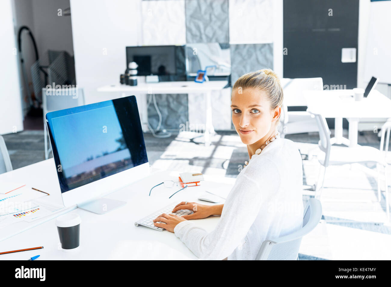 Elegant office worker Stock Photo - Alamy