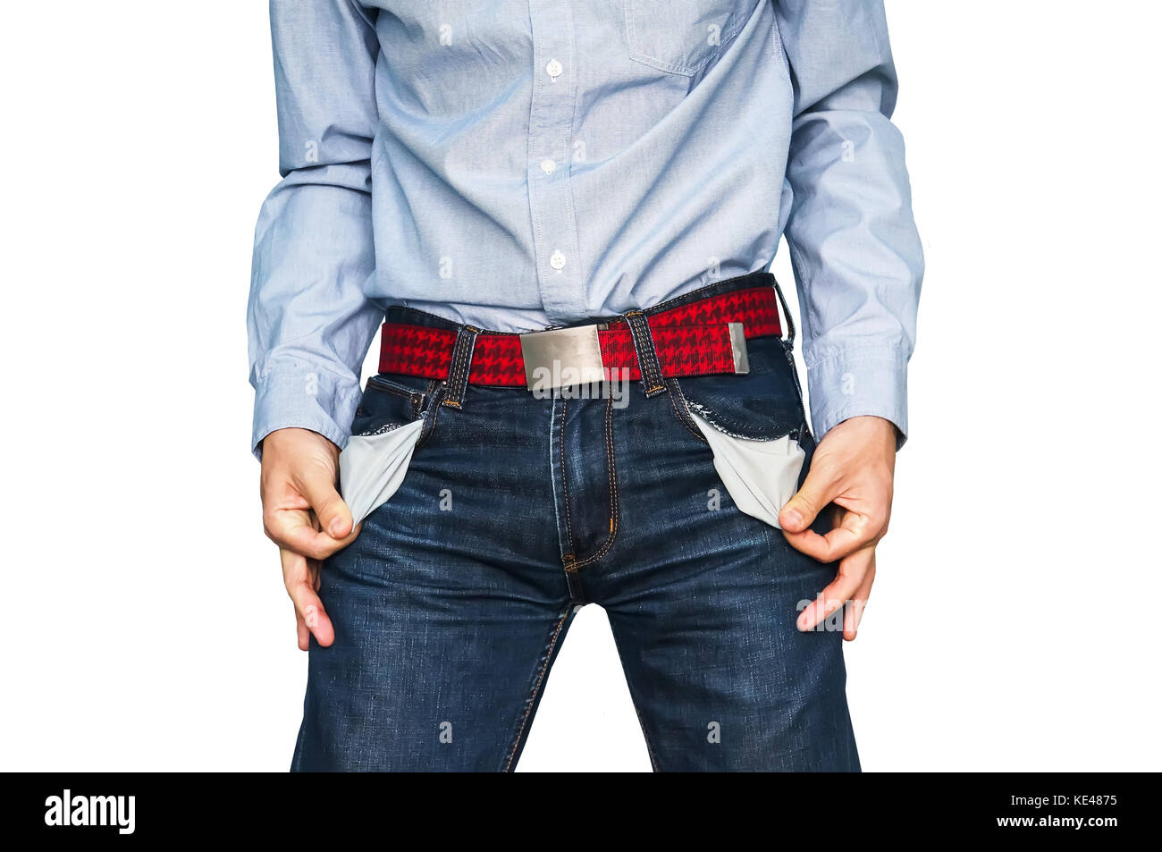 man showing his empty pockets demonstrating he has no money on white ...