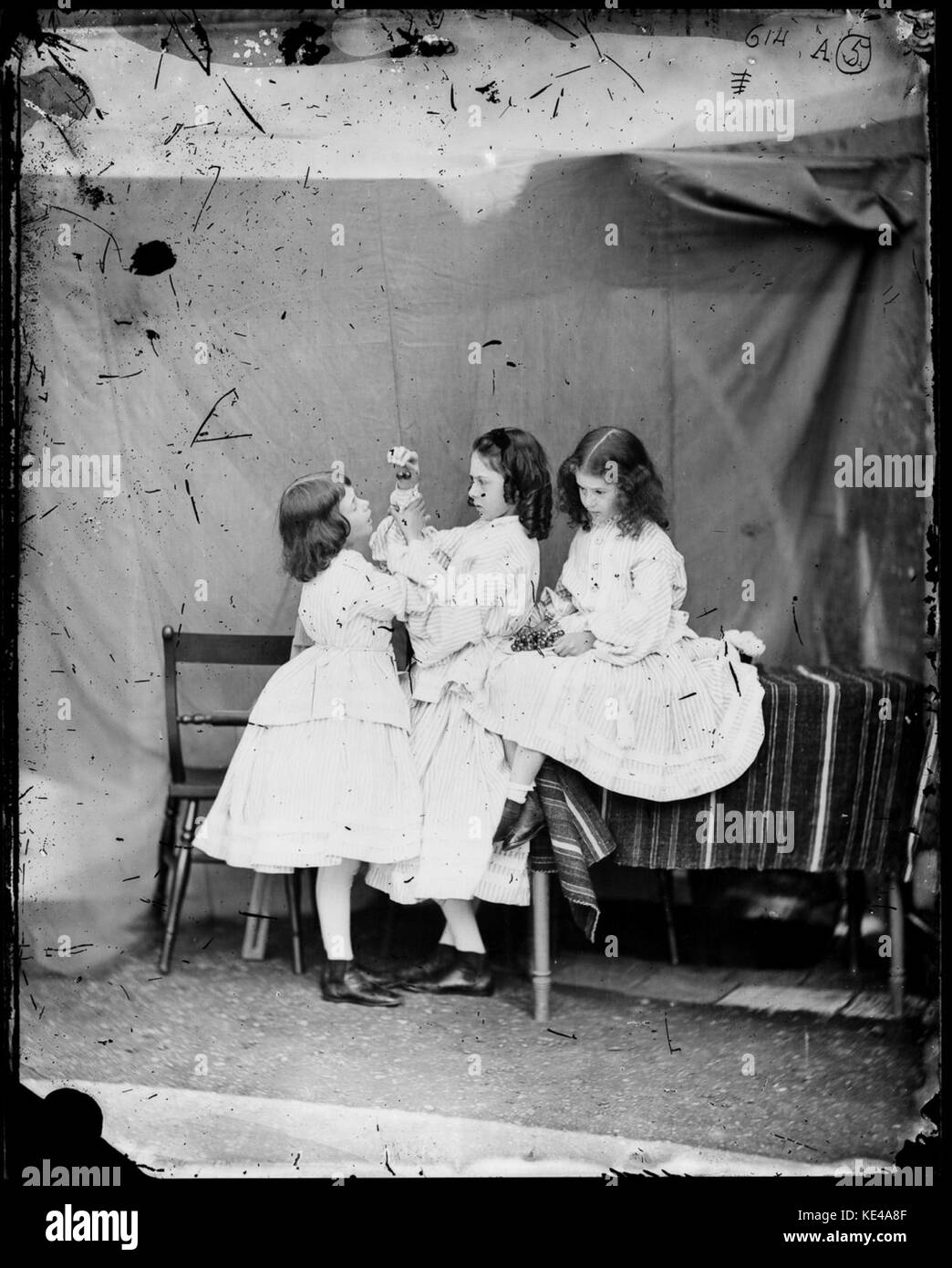 Alice in wonderland book cover hi-res stock photography and images - Alamy