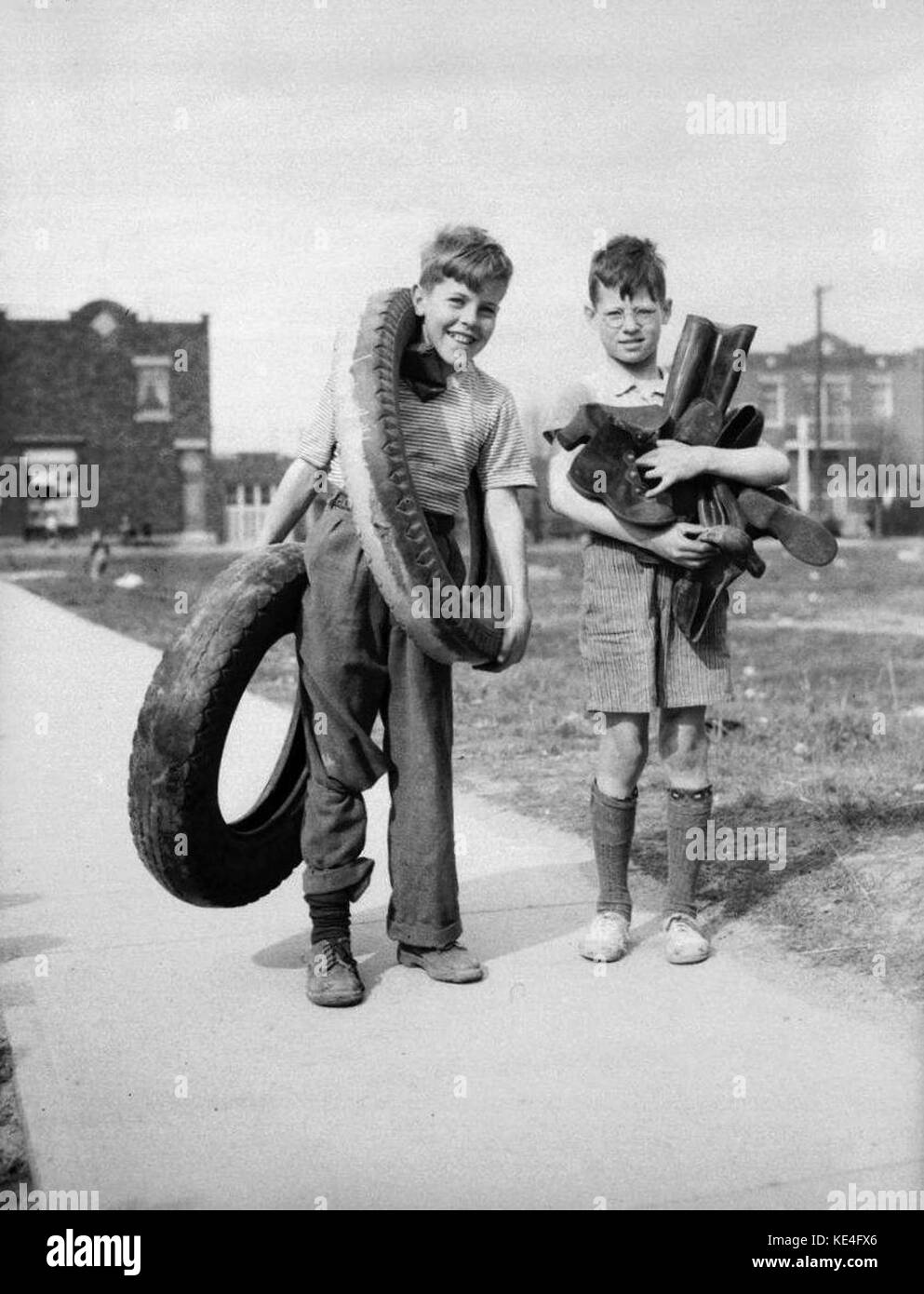 Children collecting rubber Stock Photo - Alamy