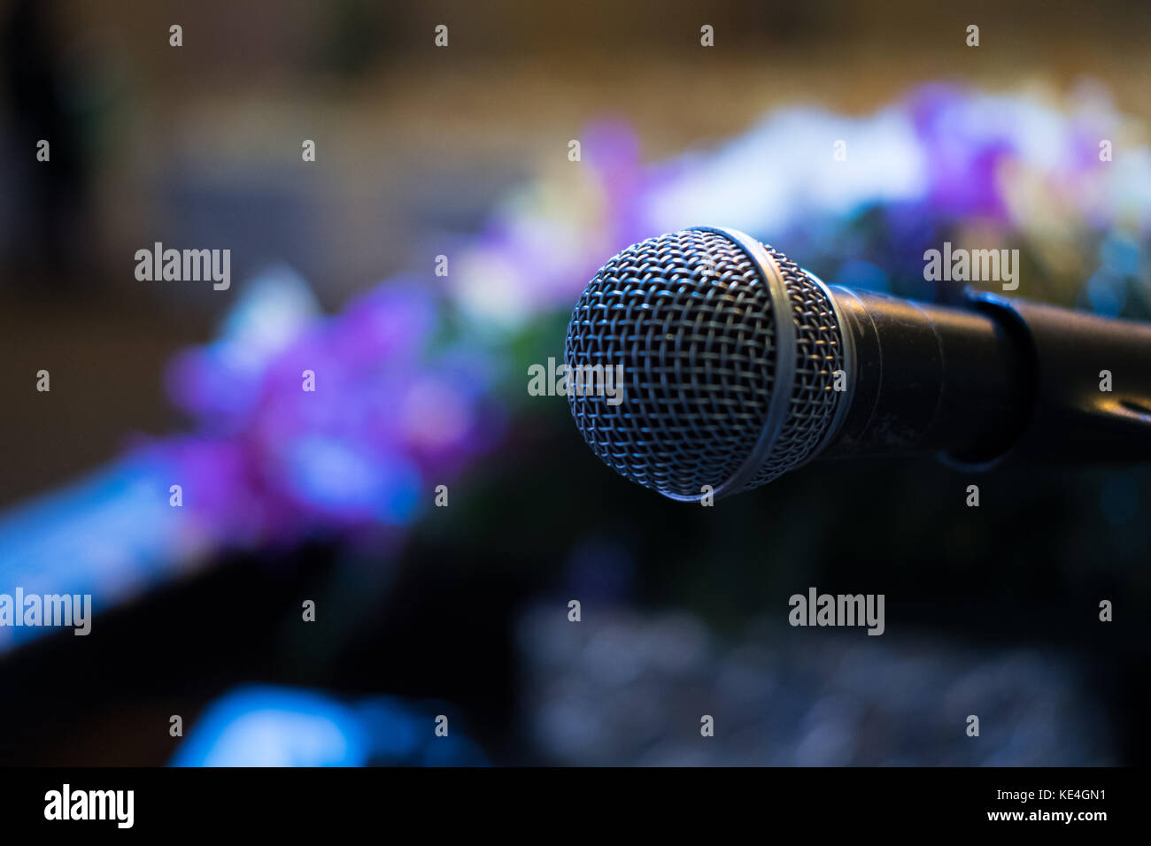 microphone in modern conference hall interior with white chairs ...