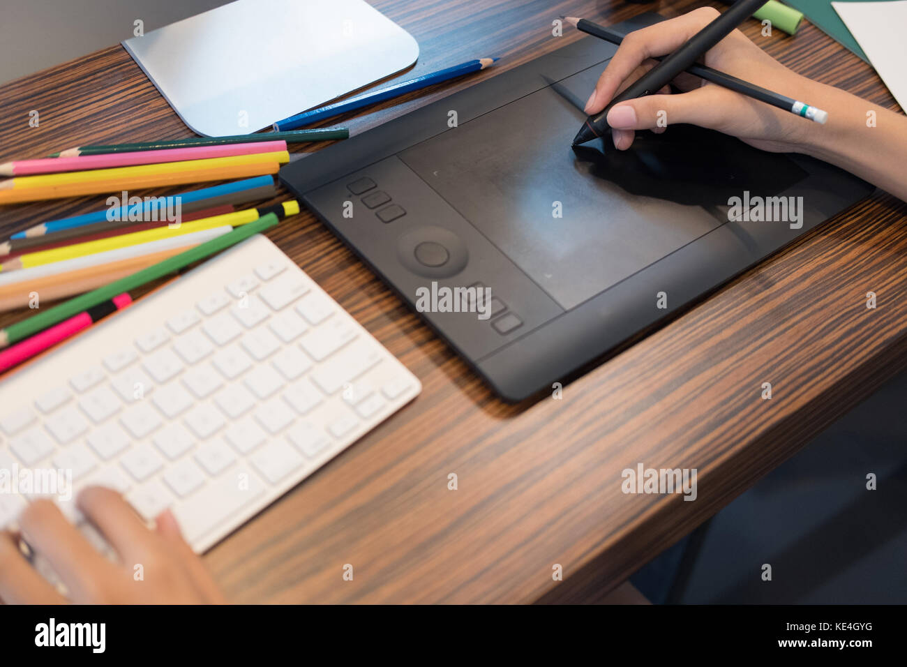 interior designer drawing on graphic tablet at office. artist working ...