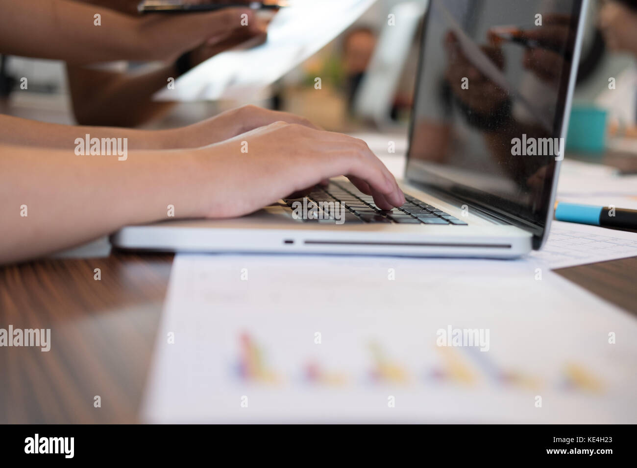 young people working with computer at workplace. businessman and ...