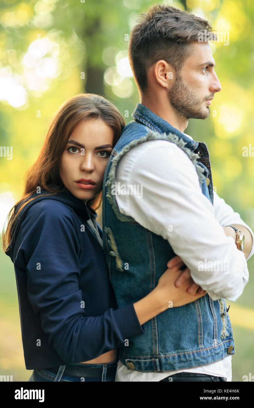 Young couple embrace from behind hi-res stock photography and images ...