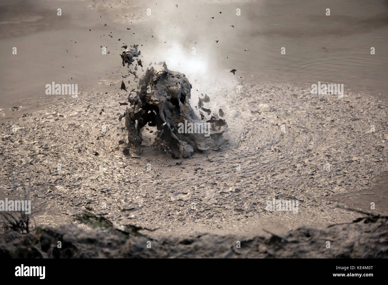 Close-up of a bubbling mud pool, in the Waiotapu active geothermal area ...