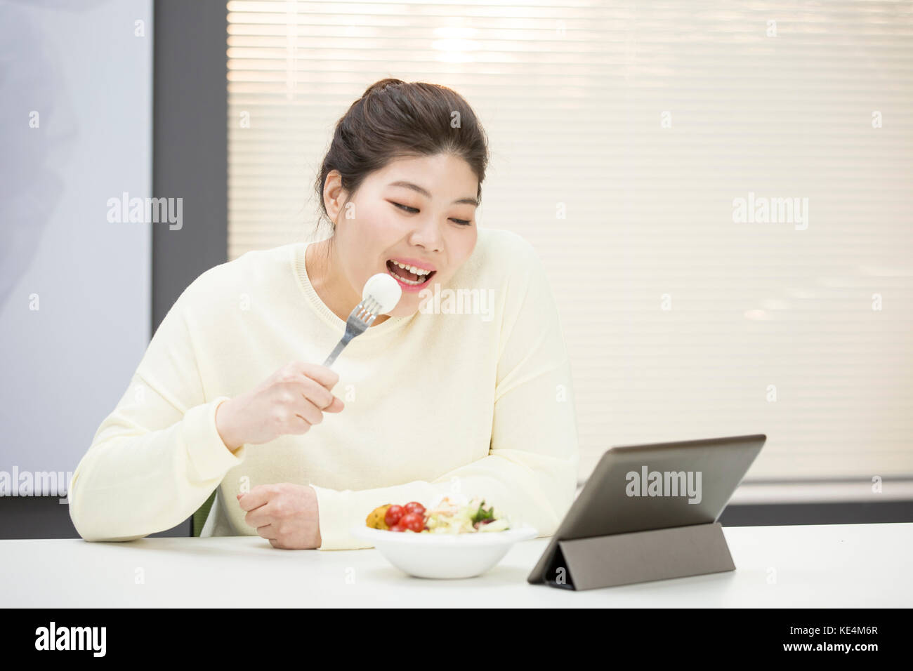 Person eating using fork hi-res stock photography and images - Alamy