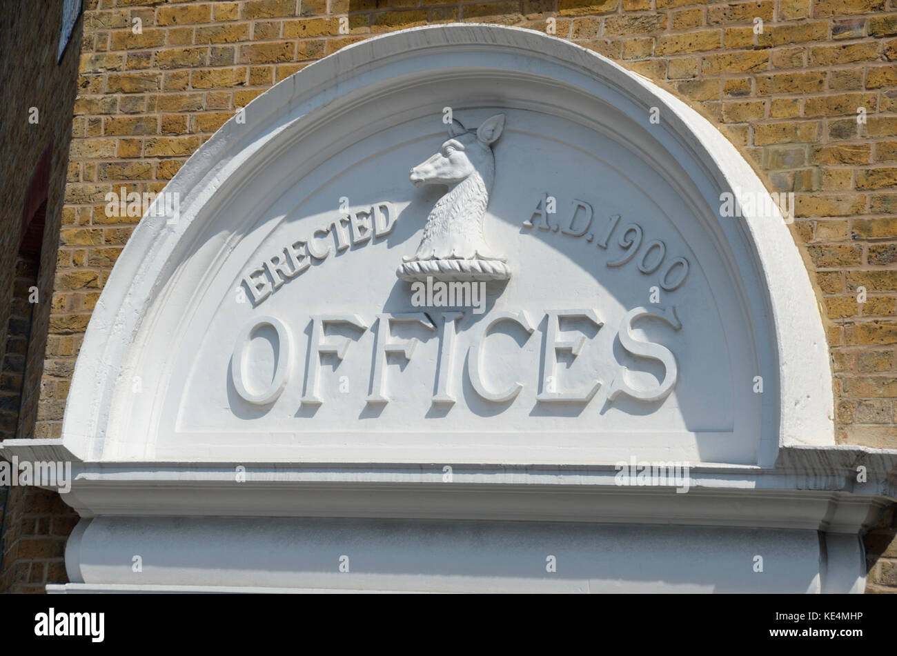 Stone ’Offices’ sign above the entrance to a period building, London ...