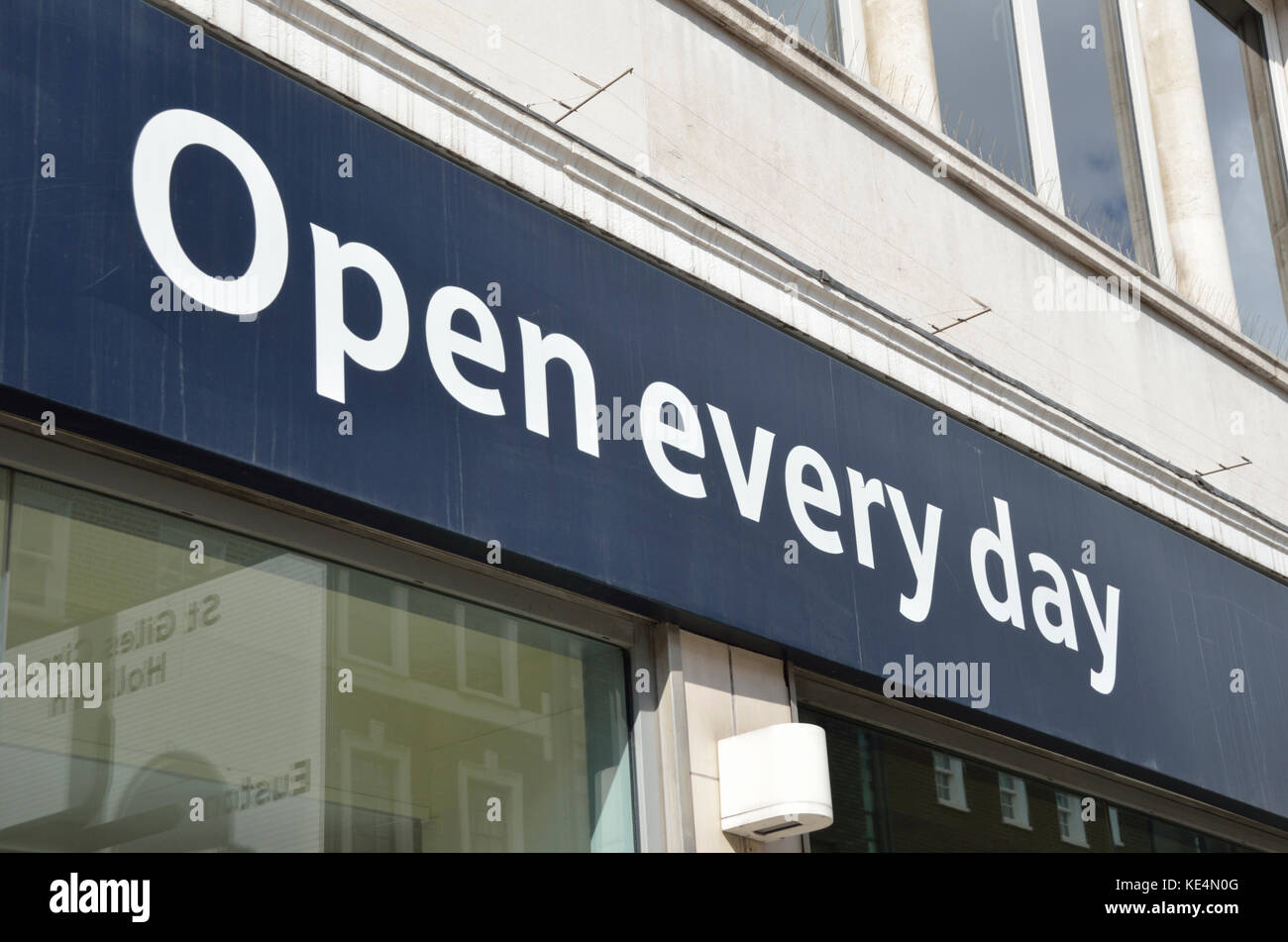 ’Open every day’ sign outside a high street supermarket Stock Photo - Alamy