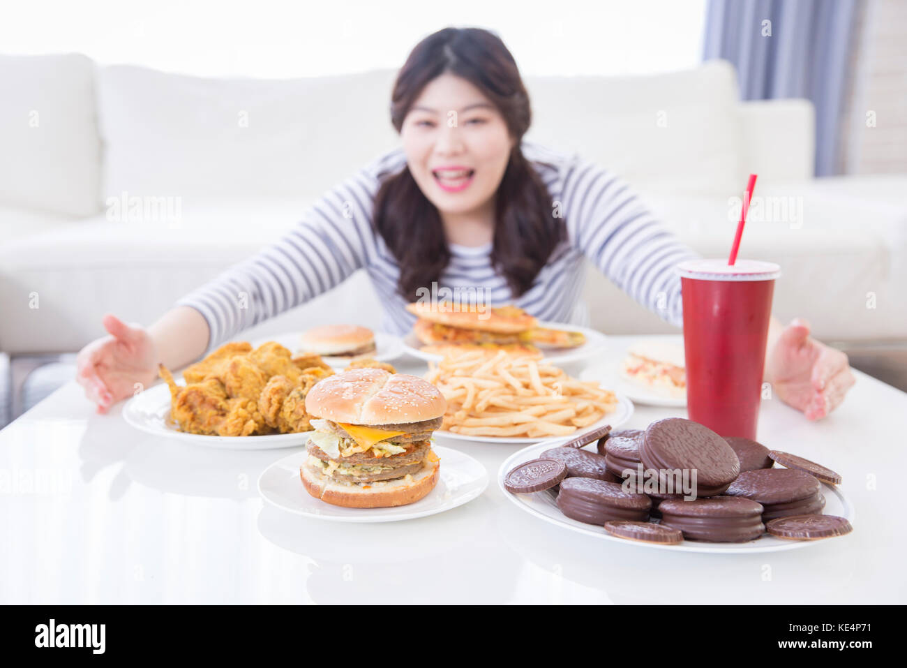 Woman fast food hi-res stock photography and images - Alamy