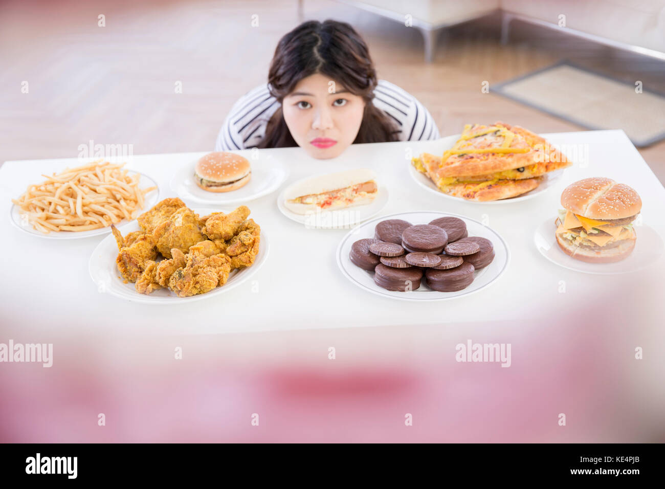 Portrait of young fat woman gloomy Stock Photo - Alamy