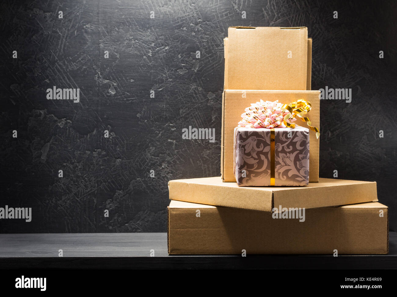 cardboard box at black background surface Stock Photo - Alamy