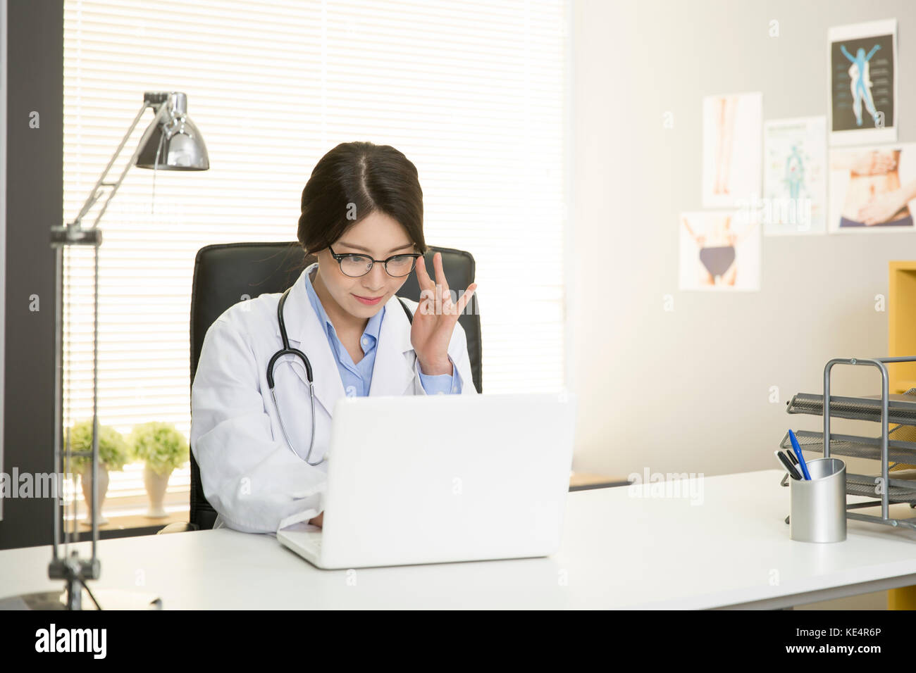 Portrait of young confident female doctor at obesity clinic Stock Photo ...